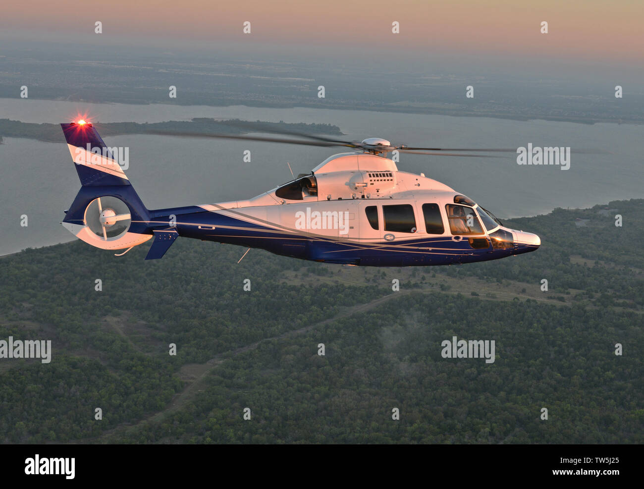 Corporate, Executive, military and law enforcement helicopter in flight ...