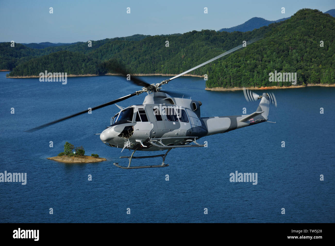 Corporate, Executive, military and law enforcement helicopter in flight ...