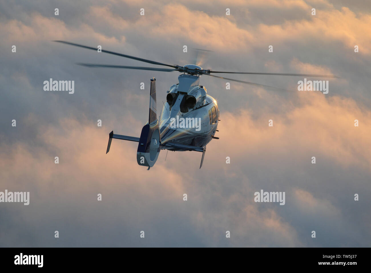 Corporate, Executive, military and law enforcement helicopter in flight ...