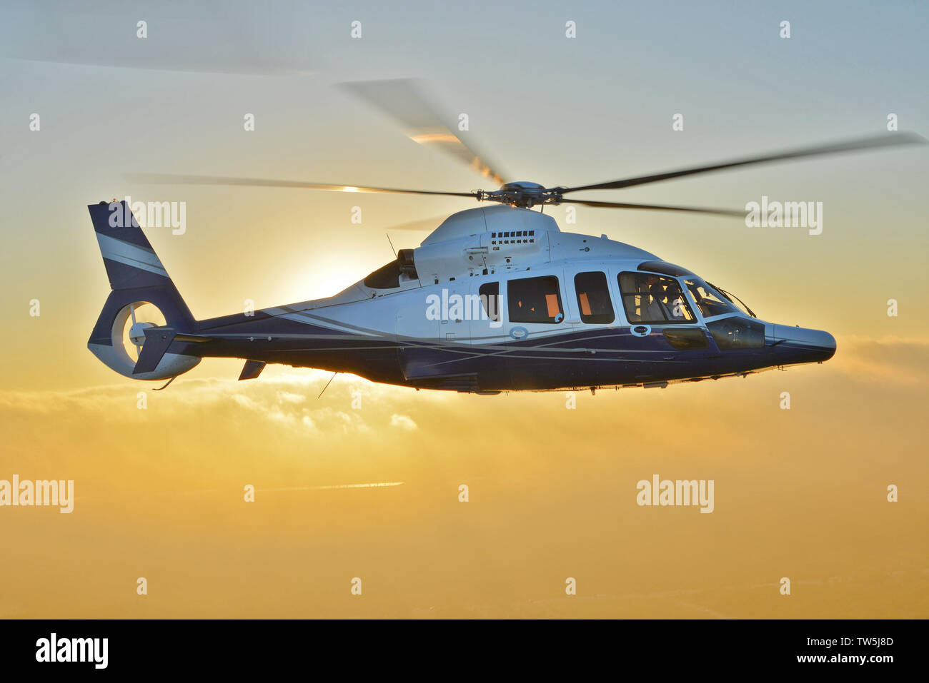 Corporate, Executive, military and law enforcement helicopter in flight ...