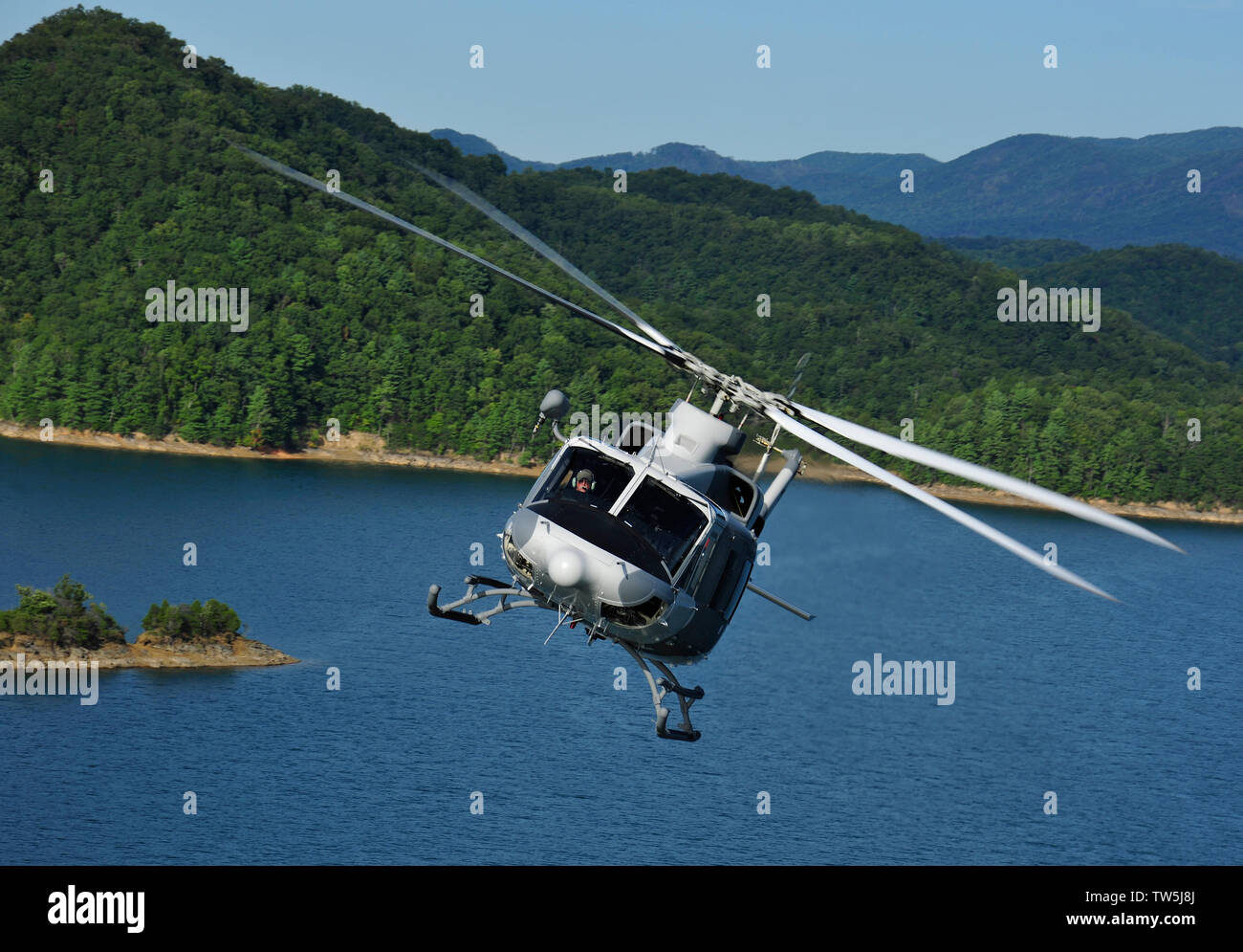 Corporate, Executive, military and law enforcement helicopter in flight ...