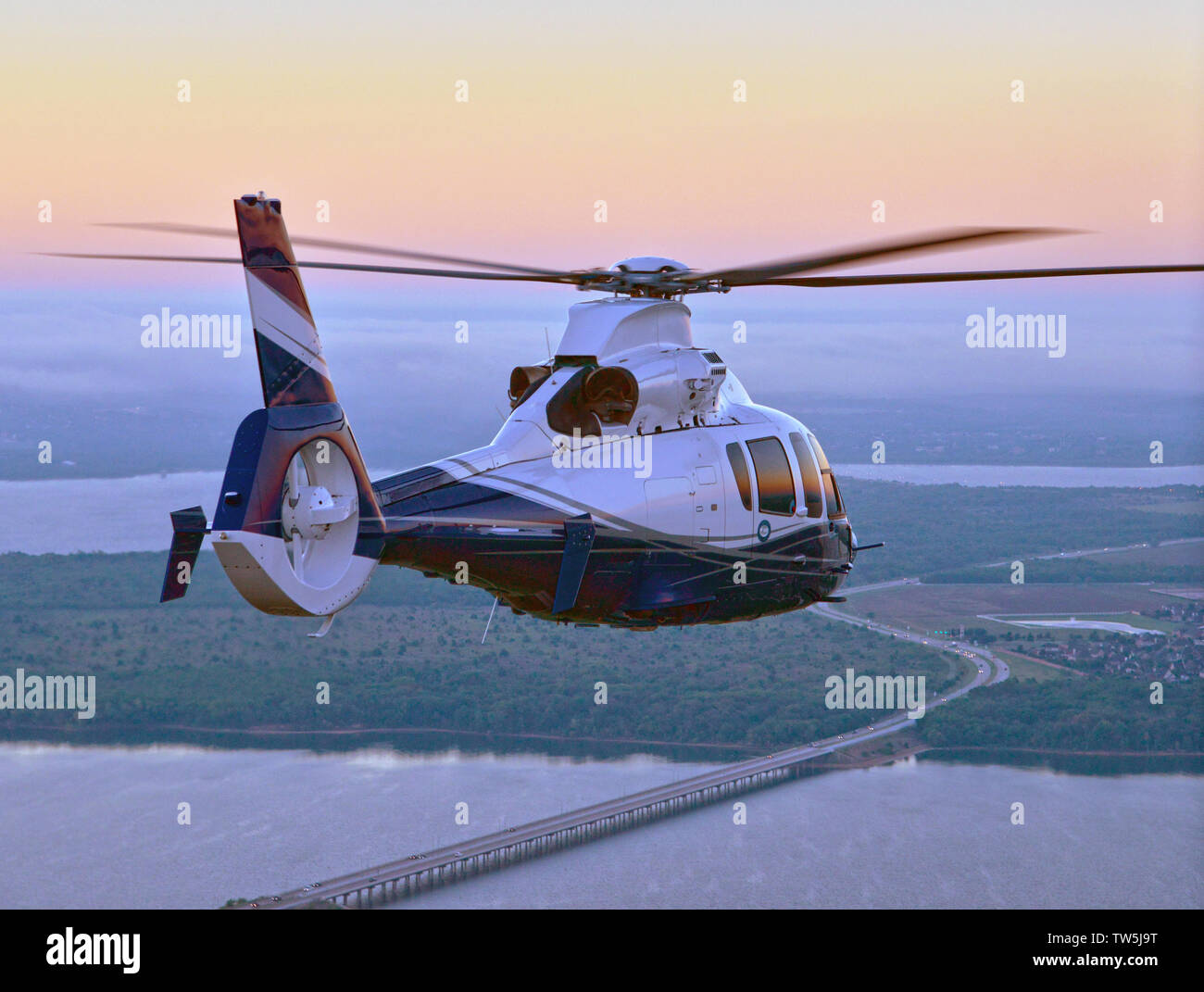 Corporate, Executive, military and law enforcement helicopter in flight ...