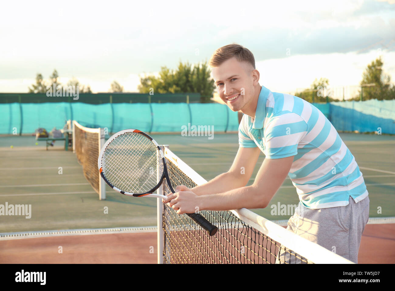 Man on tennis field hi-res stock photography and images - Alamy