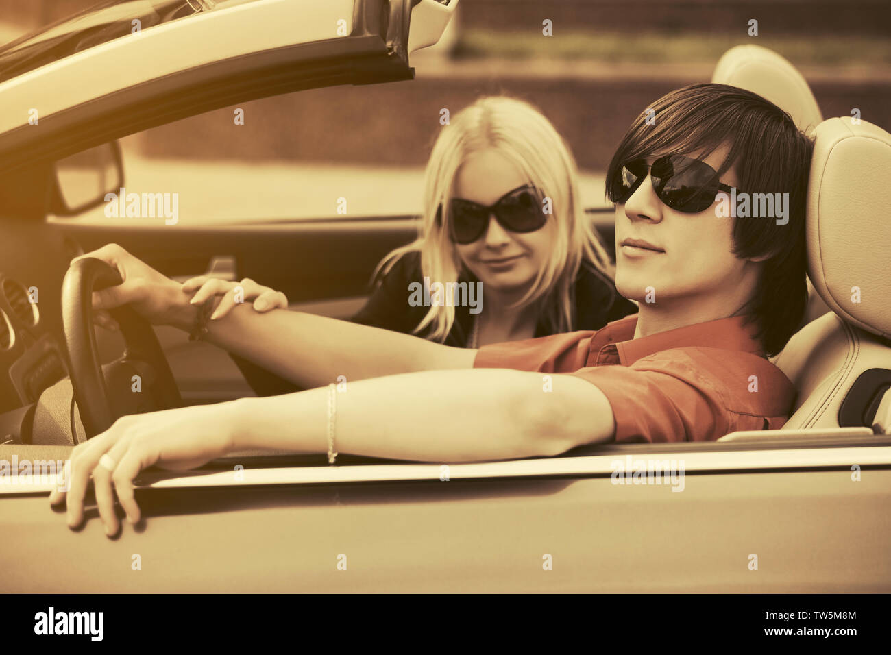 Teens driving convertible hi-res stock photography and images - Alamy