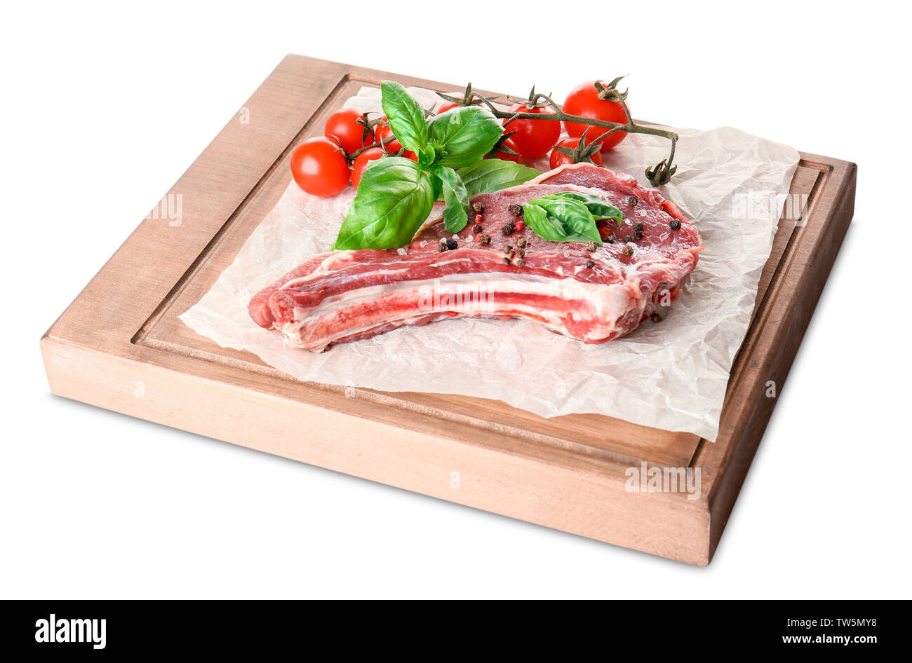 Wooden board with fresh raw pork rib isolated on white Stock Photo - Alamy
