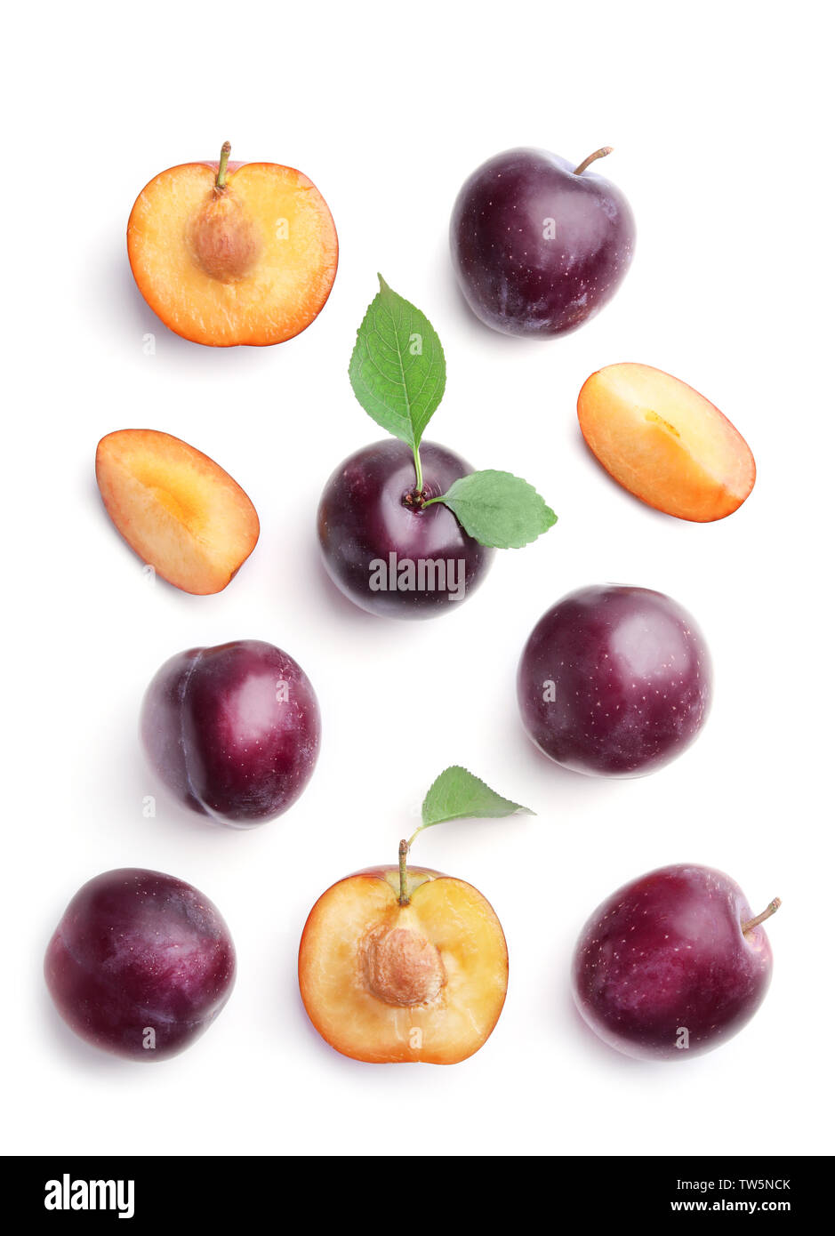 Fresh ripe plums on white background Stock Photo - Alamy