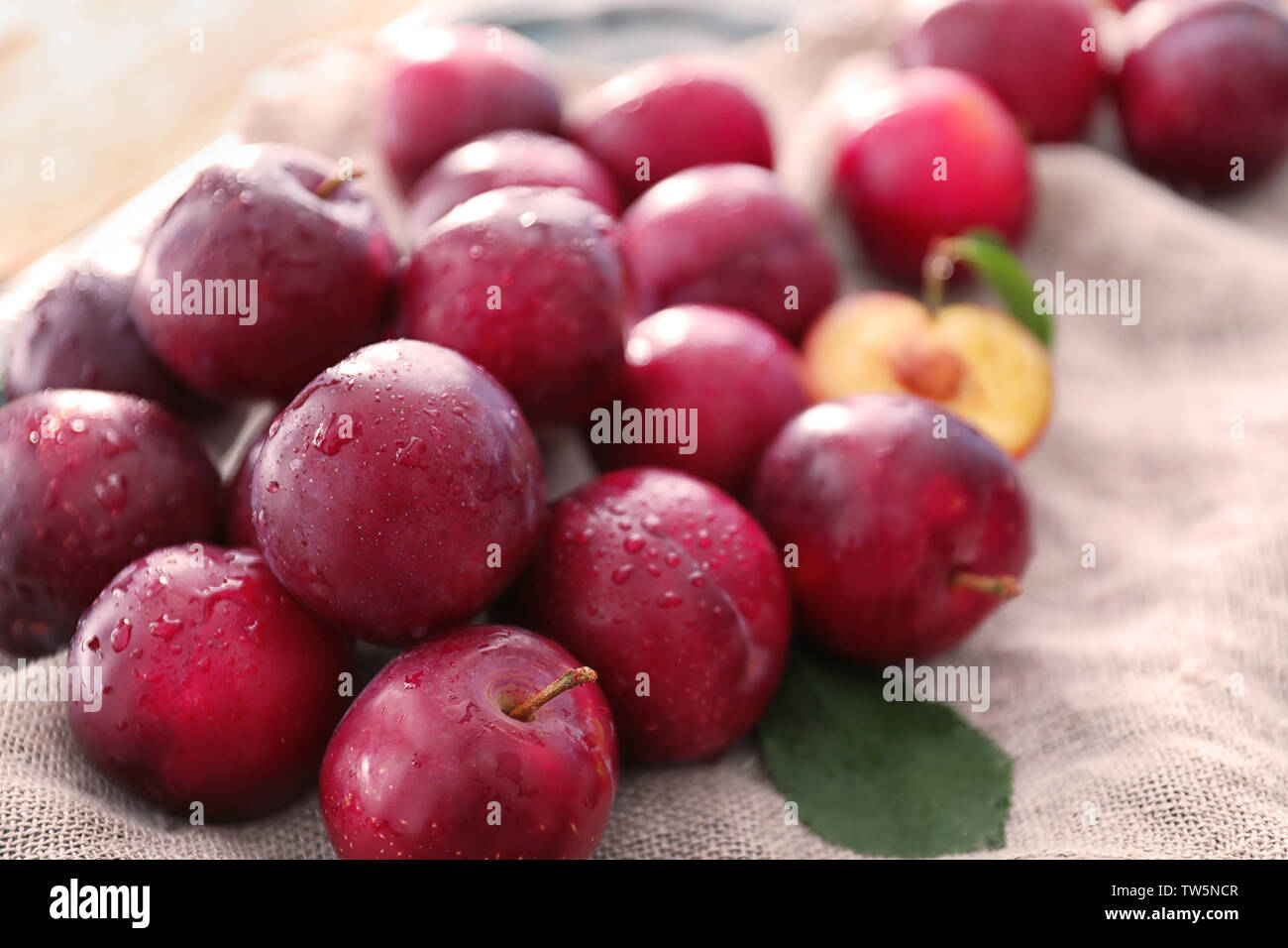 Fresh ripe plums on sackcloth Stock Photo - Alamy