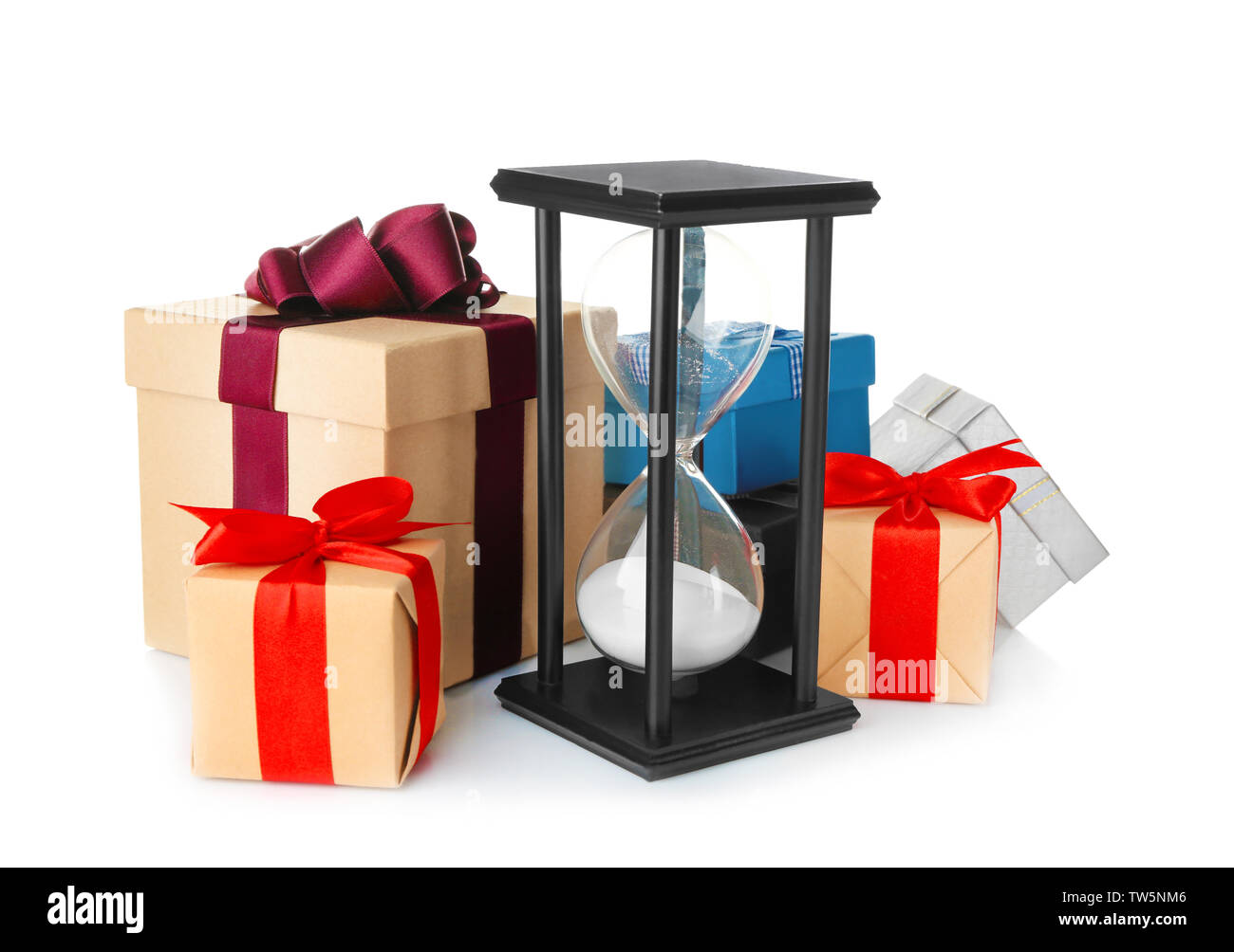 Hourglass and gifts on white background. Christmas countdown concept ...