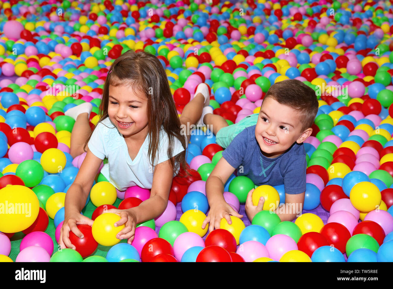 Children play center ball pit hi-res stock photography and images - Alamy