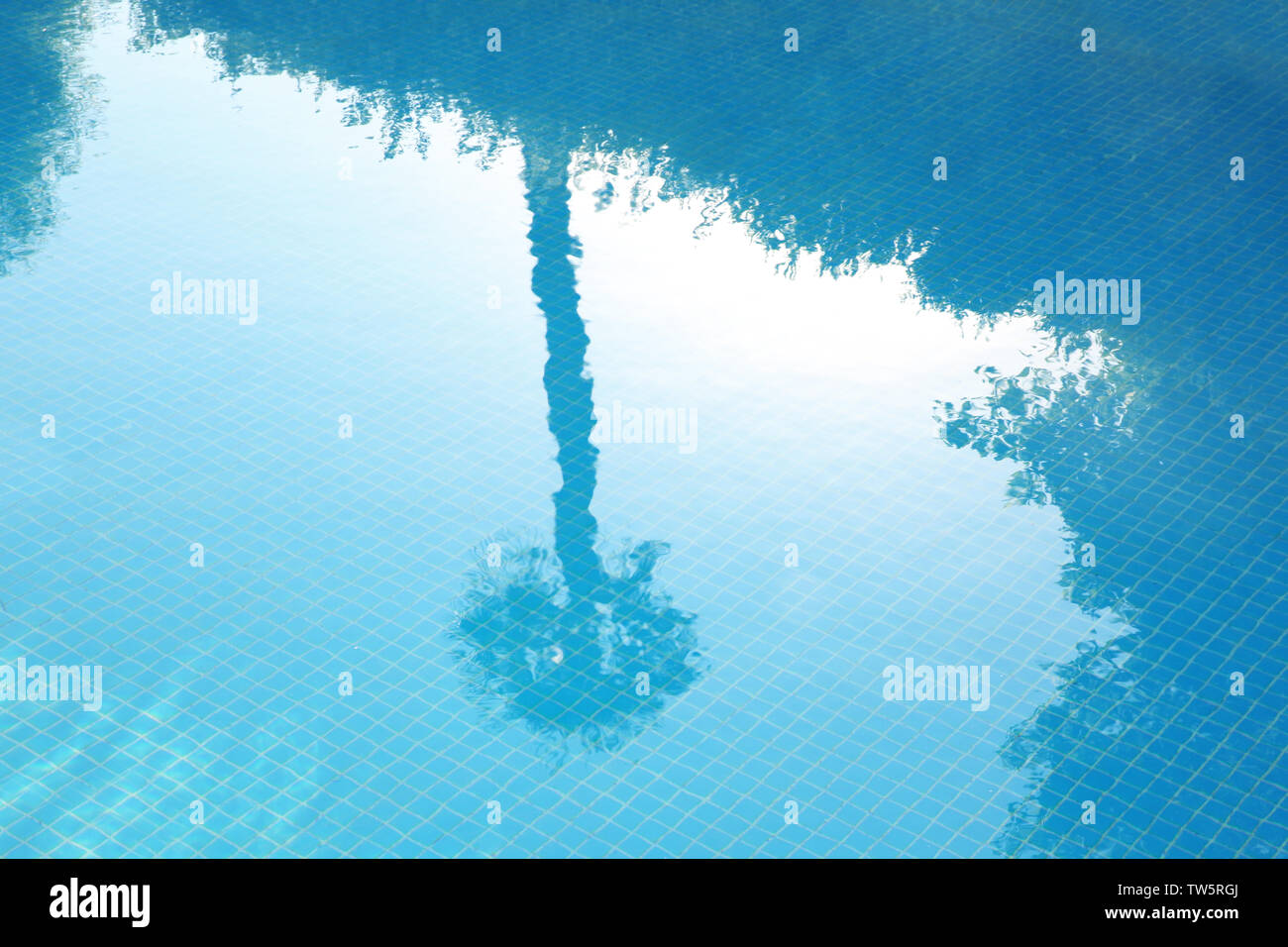 Clean blue water in swimming pool Stock Photo - Alamy