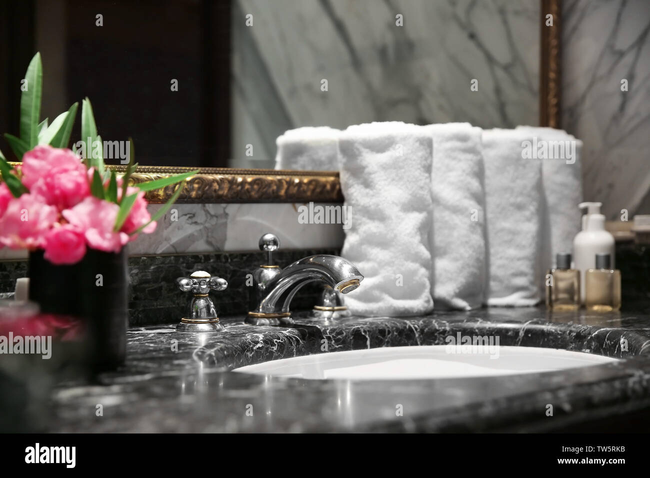 Sink in modern hotel bathroom Stock Photo - Alamy