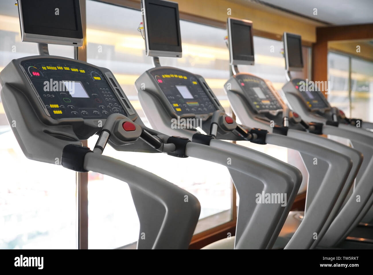 Modern treadmills in gym Stock Photo - Alamy