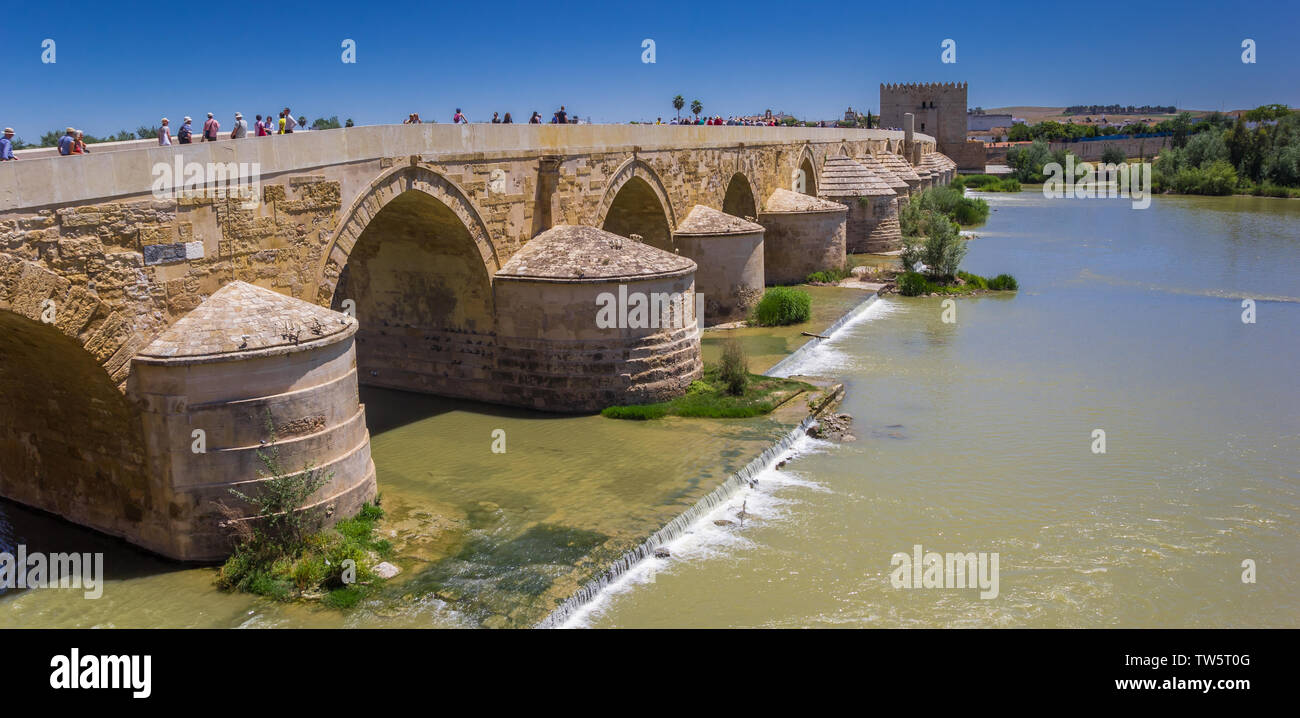 Panorama of the roman bridge and city gate in Cordoba, Spain Stock ...