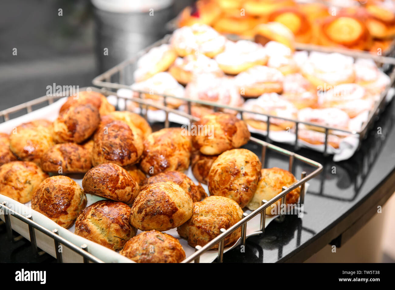 Different kinds of bakery products in baskets at buffet Stock Photo - Alamy