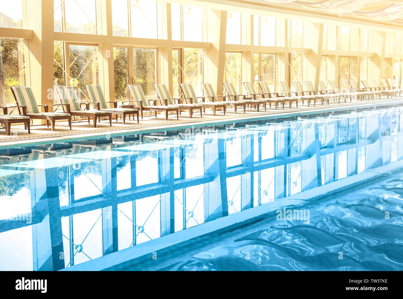 Beautiful swimming pool in modern hotel Stock Photo - Alamy