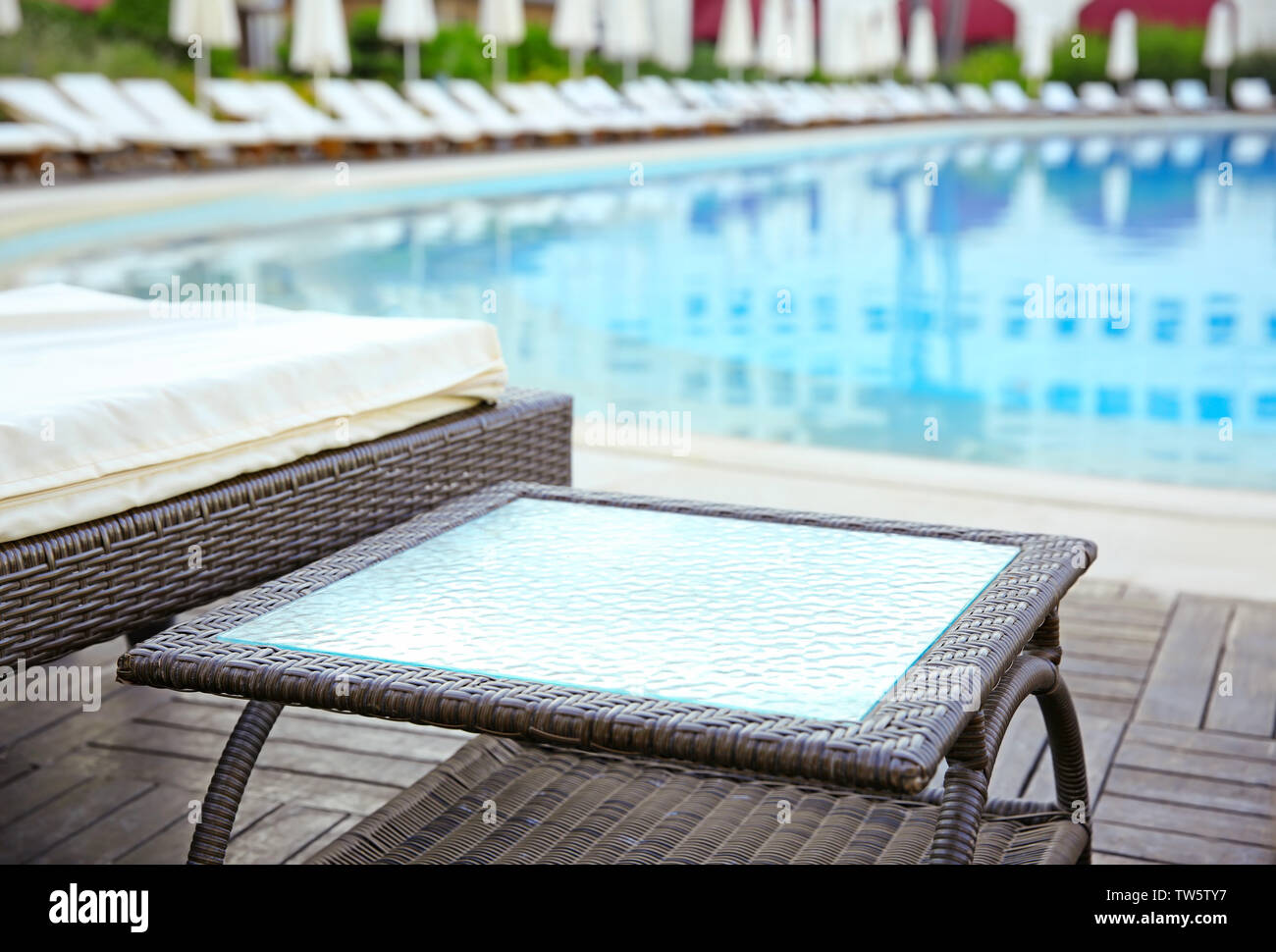 Hotel poolside empty rattan hi-res stock photography and images - Alamy