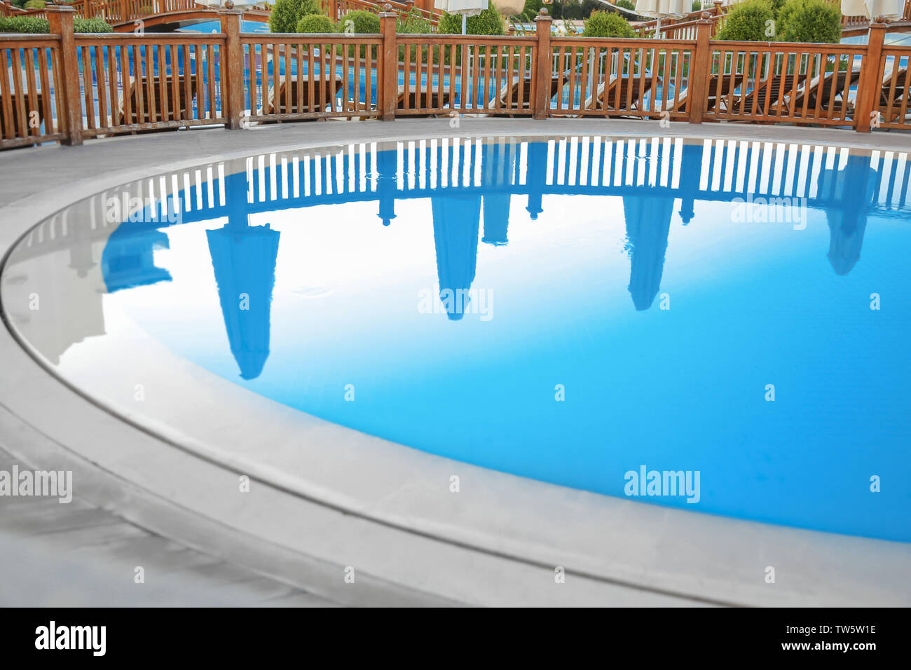 Modern swimming pool in luxury hotel Stock Photo - Alamy