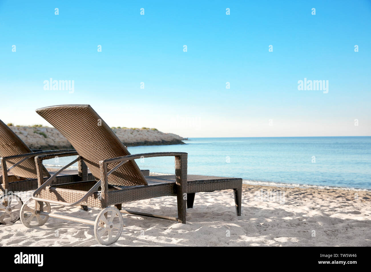 Empty sunbeds near hotel beach hi-res stock photography and images - Alamy