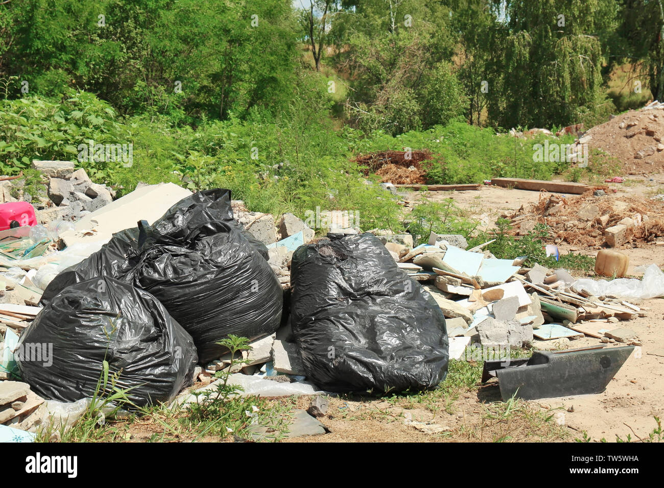 Garbage and wastes at spontaneous dump Stock Photo - Alamy