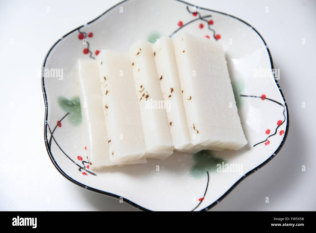 New Year's Eve dinner osmanthus sugar rice cake Stock Photo - Alamy