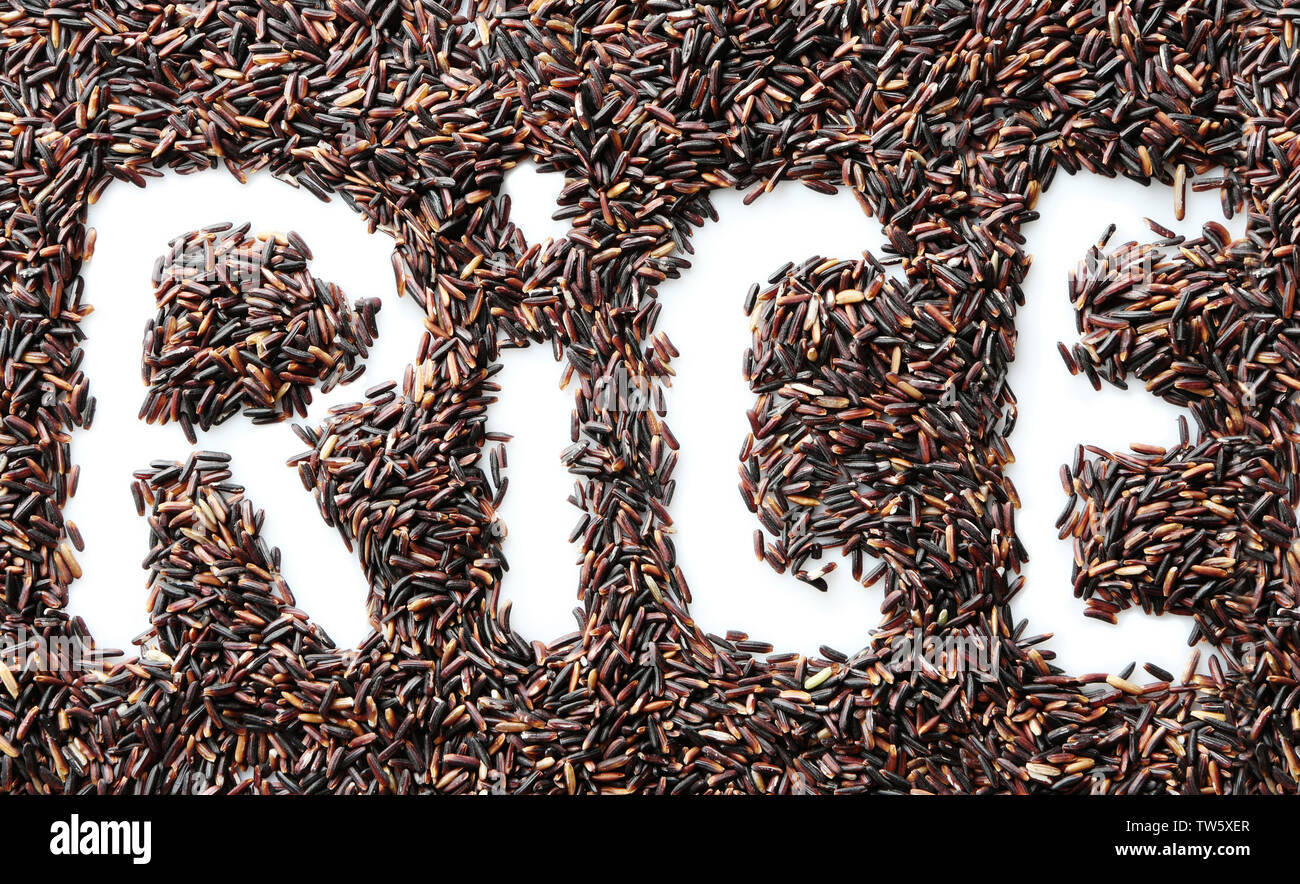 Composition with word Rice on white background Stock Photo - Alamy