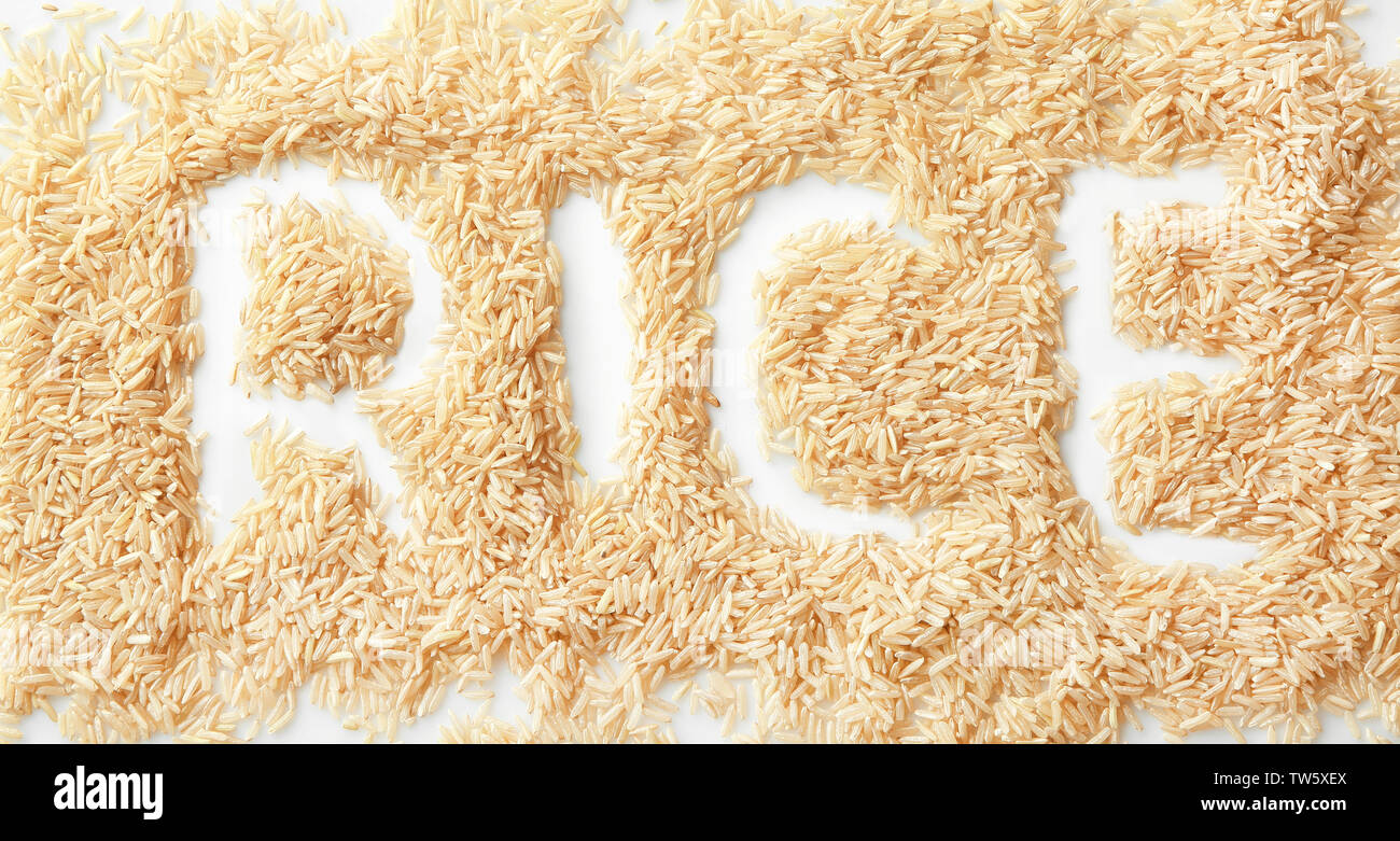 Composition with word Rice on white background Stock Photo - Alamy