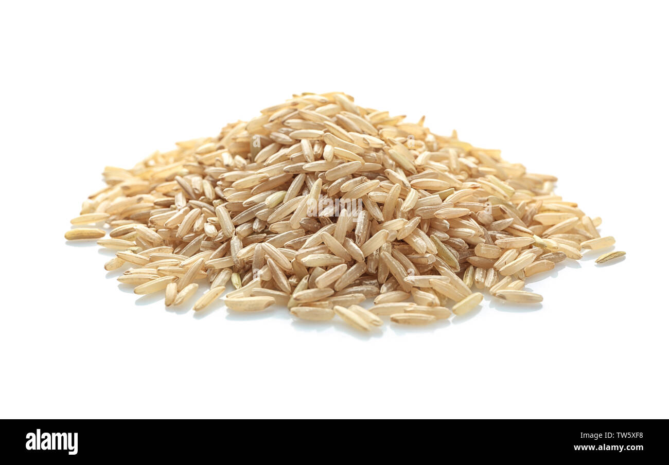 Pile of brown rice on white background Stock Photo - Alamy