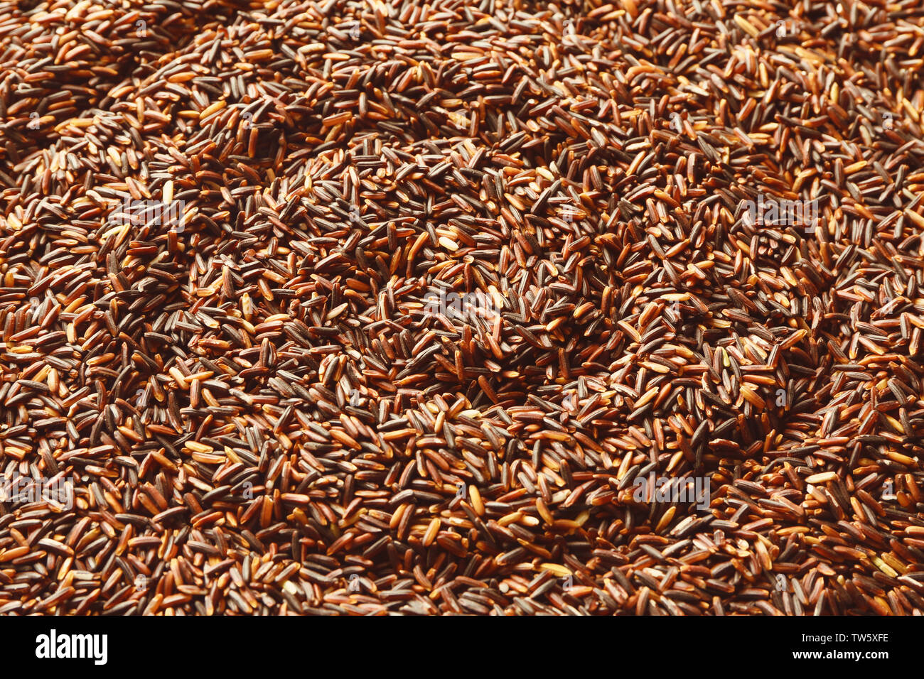 Raw black rice, closeup Stock Photo - Alamy