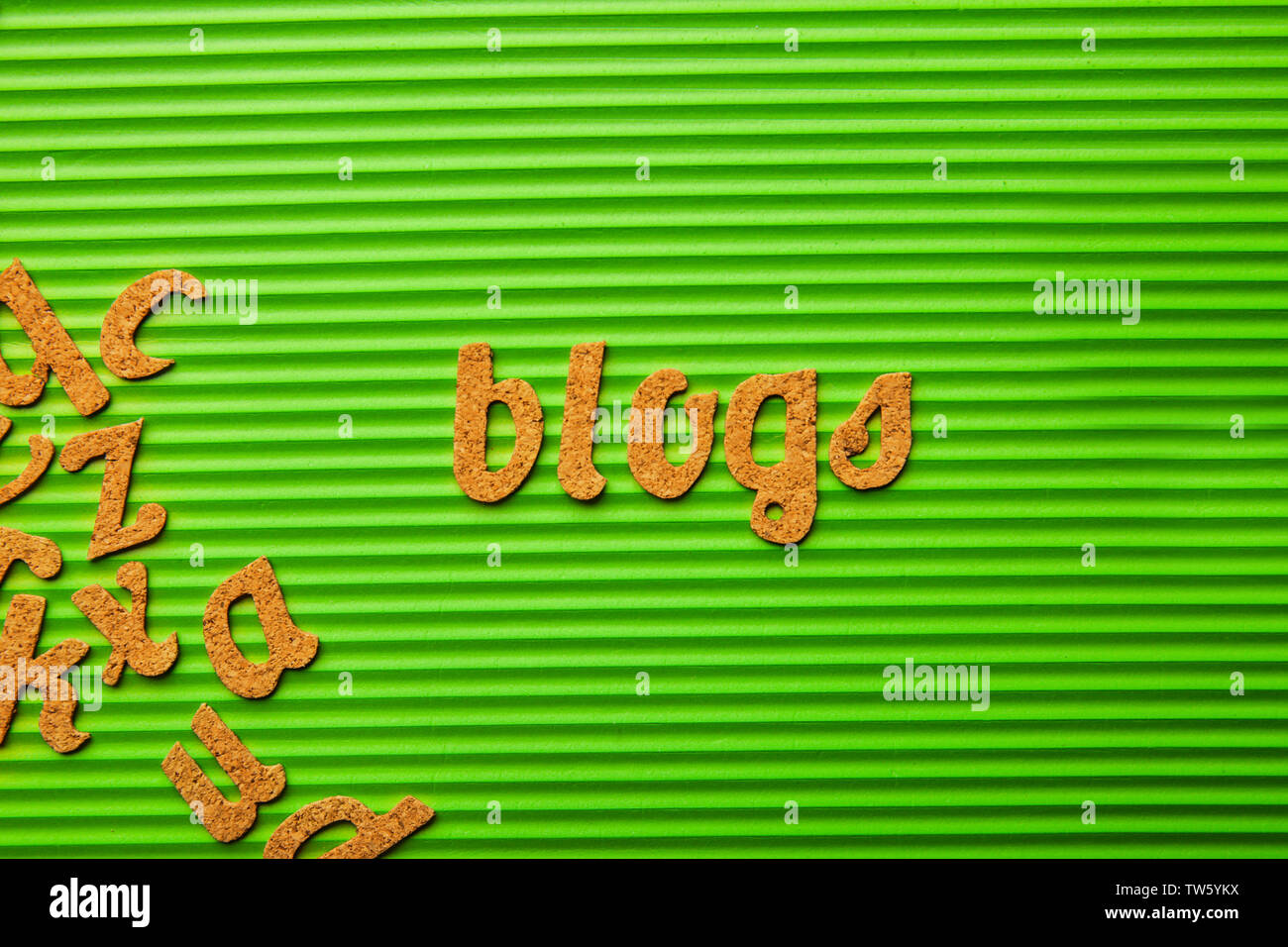 Word BLOG on green corrugated background Stock Photo - Alamy