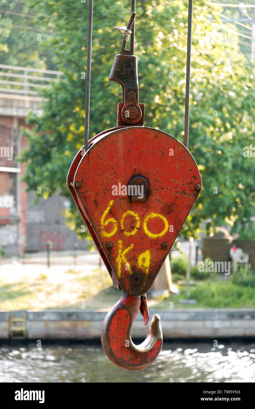 hook of crane with load limit sprayed on Stock Photo - Alamy