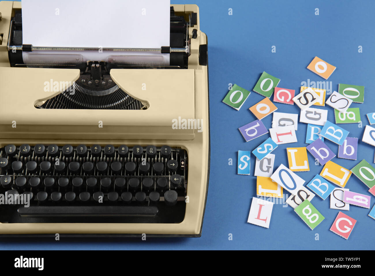 Composition with retro typewriter and letters on color background Stock ...