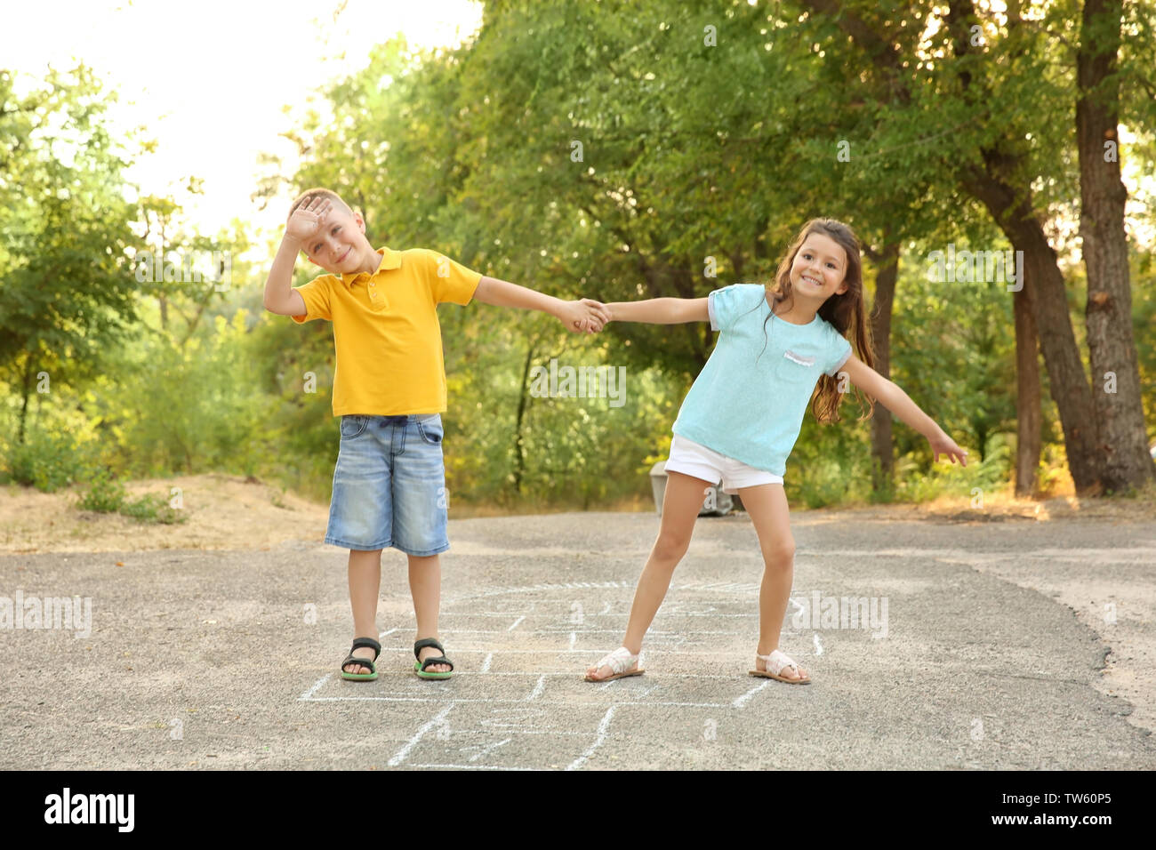 Kids playing hopscotch hi-res stock photography and images - Alamy