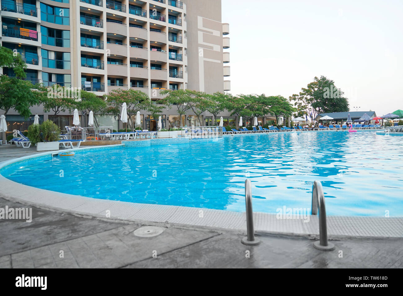 Modern swimming pool in luxury hotel Stock Photo - Alamy