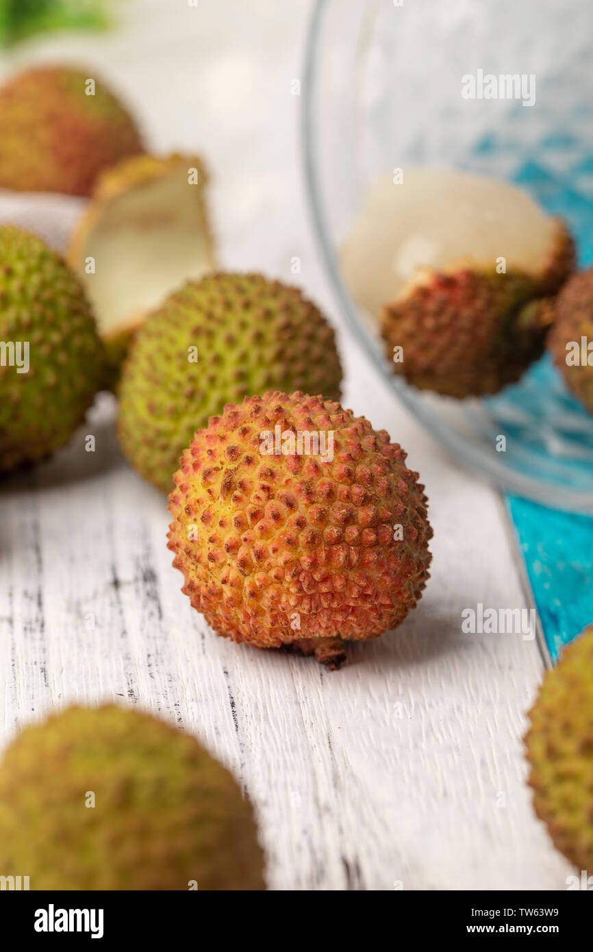 Fresh lychee on the table Stock Photo - Alamy