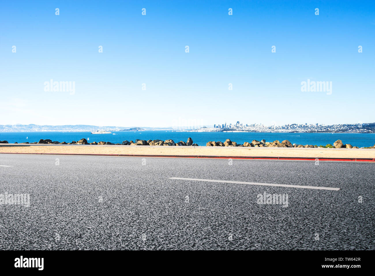 Empty asphalt road near sea hi-res stock photography and images - Alamy