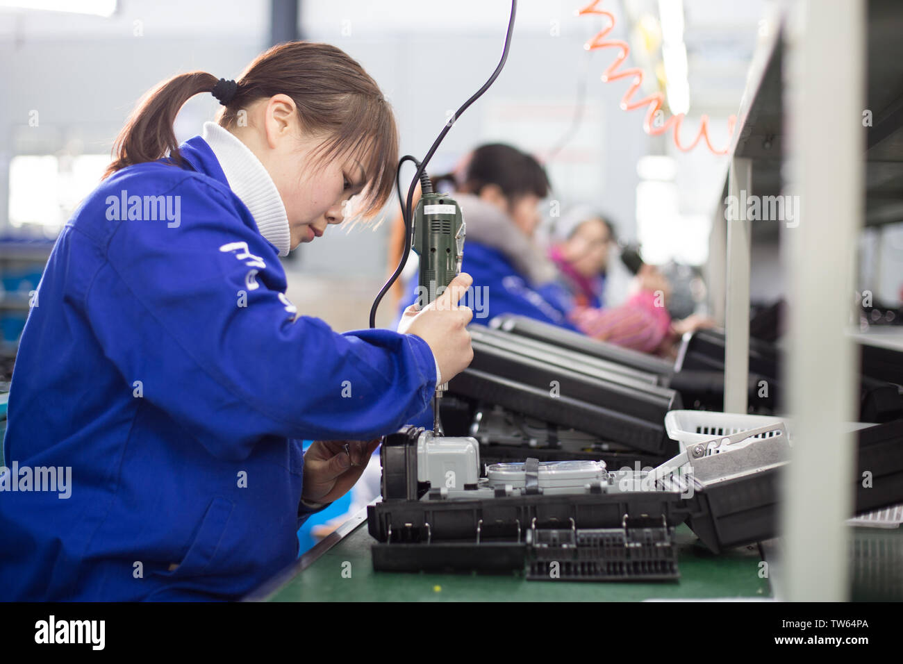 Asian factory worker production line hi-res stock photography and ...