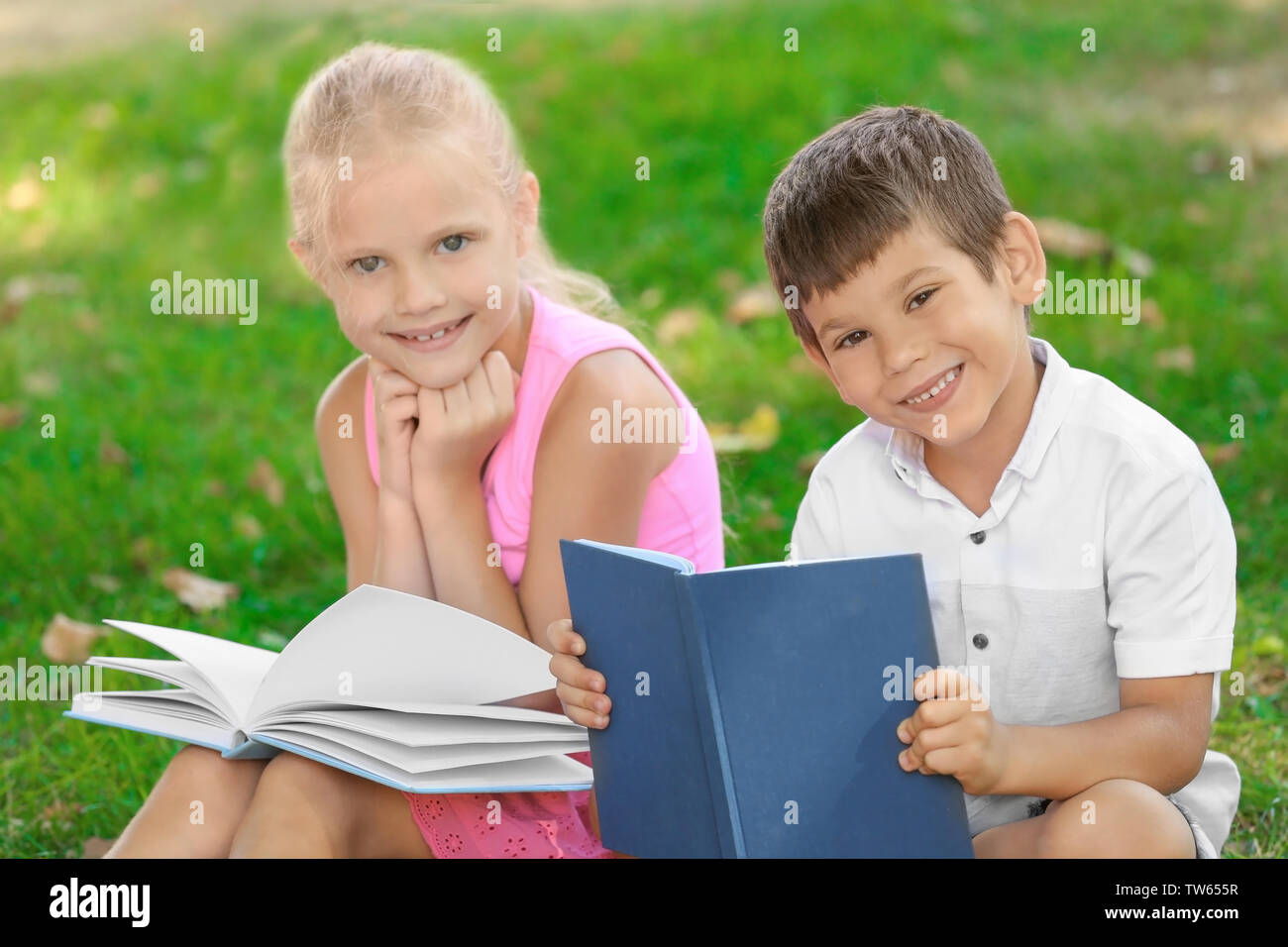 Kids Reading Books Outside