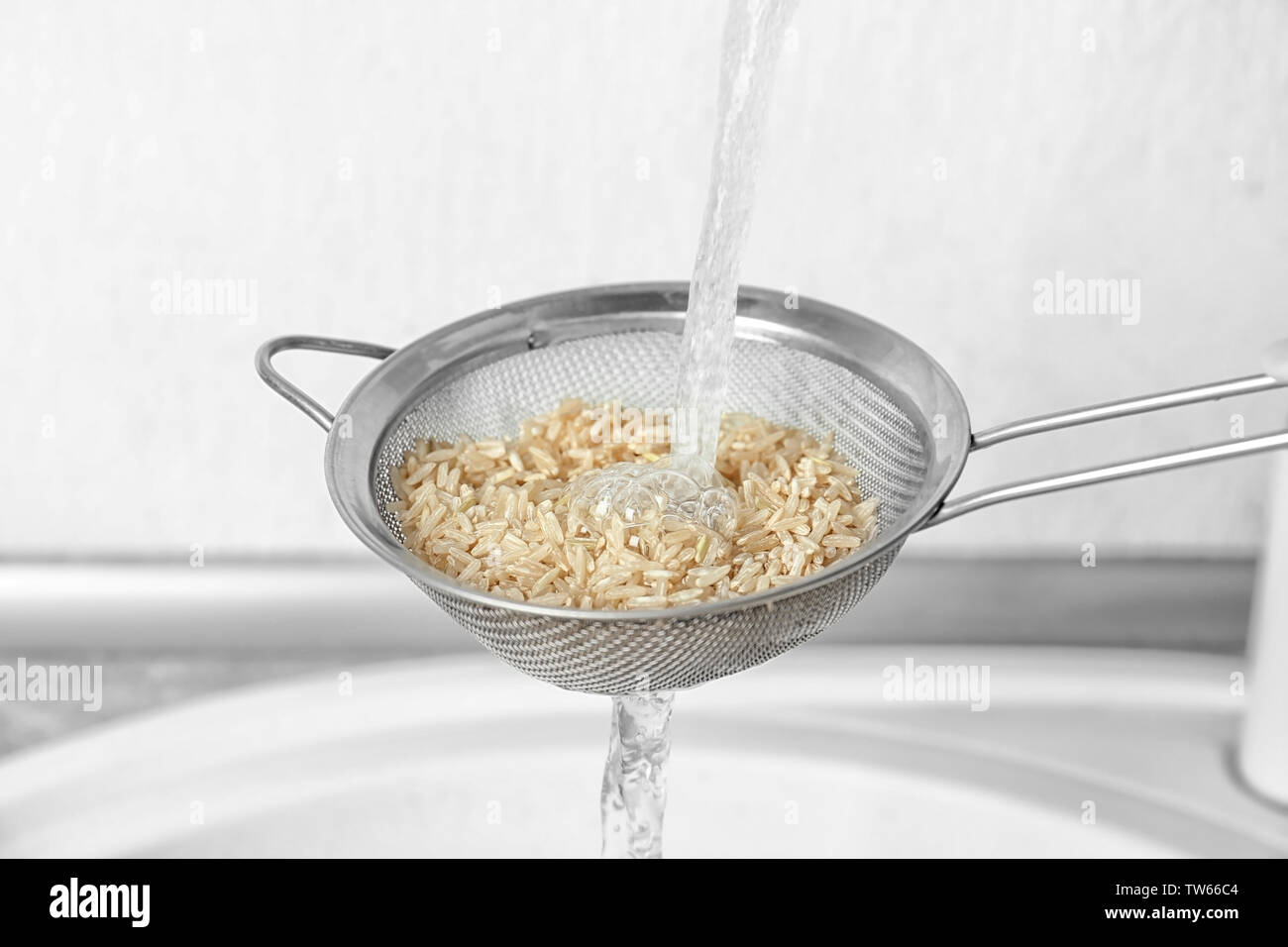 Rice washing hi-res stock photography and images - Alamy