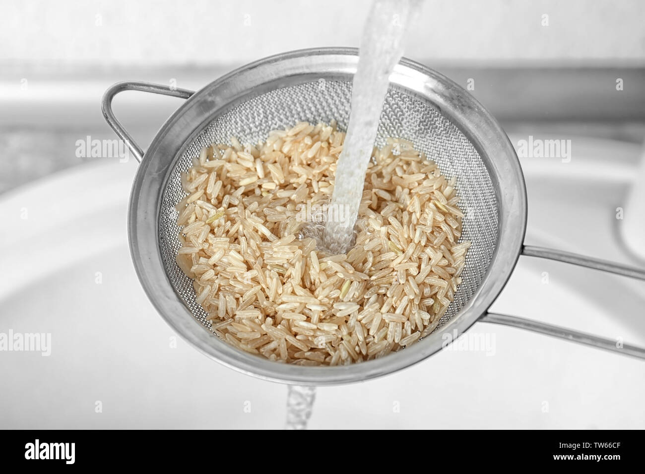 Washing of rice hi-res stock photography and images - Alamy