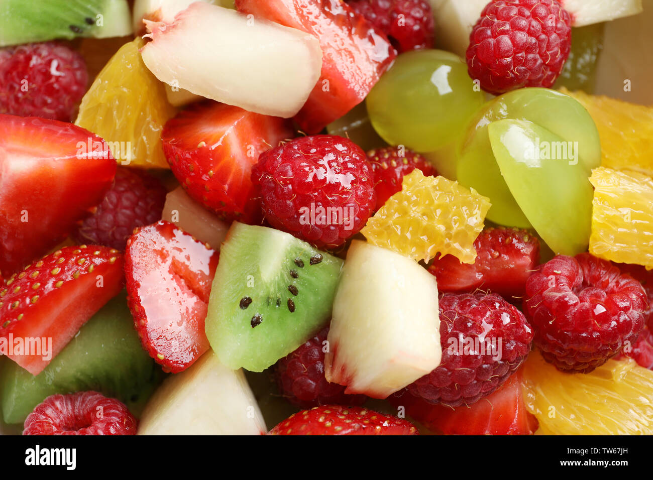 Delicious fruit salad, closeup Stock Photo - Alamy