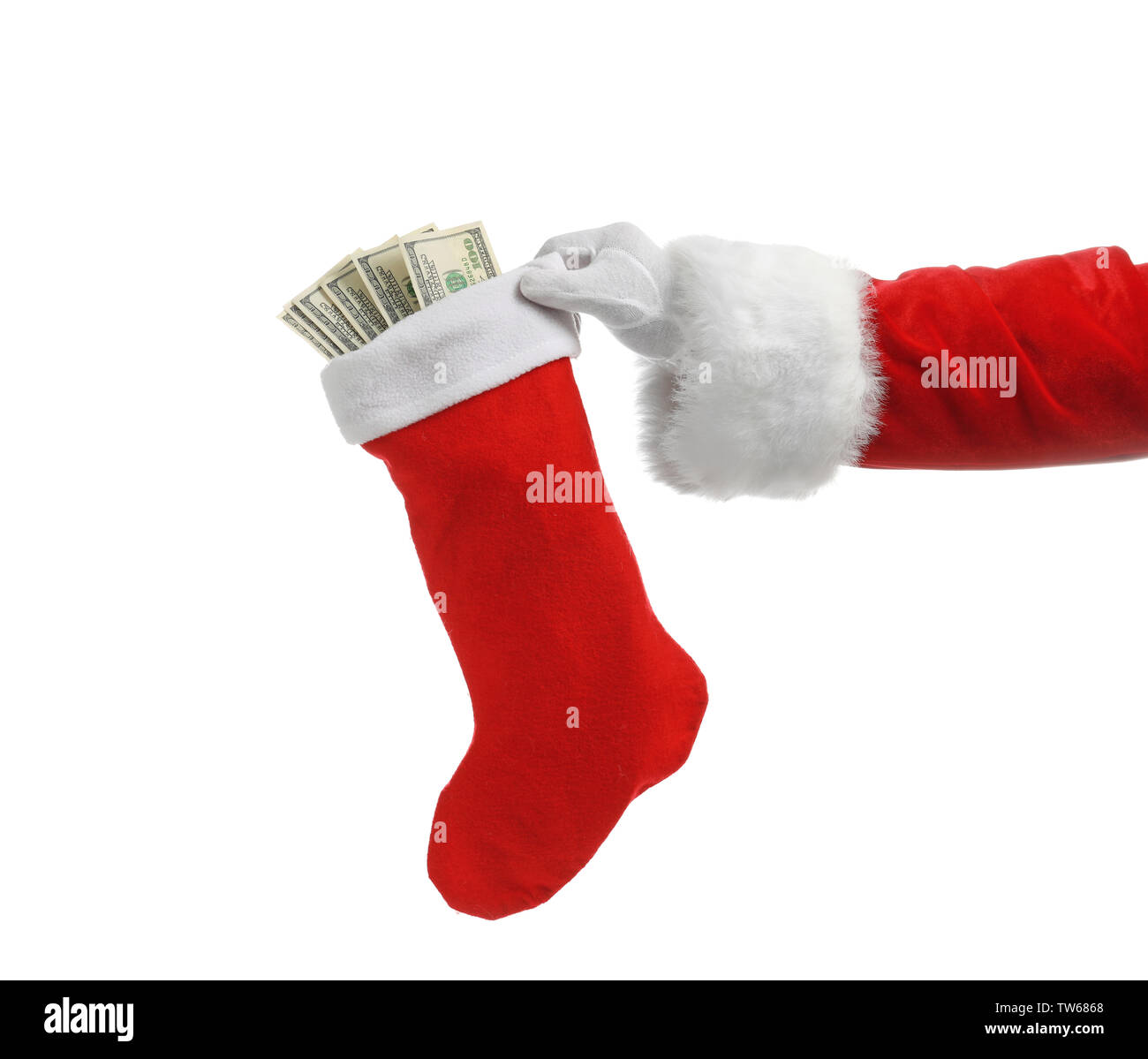 Santa Claus holding stocking with money on white background Stock Photo ...