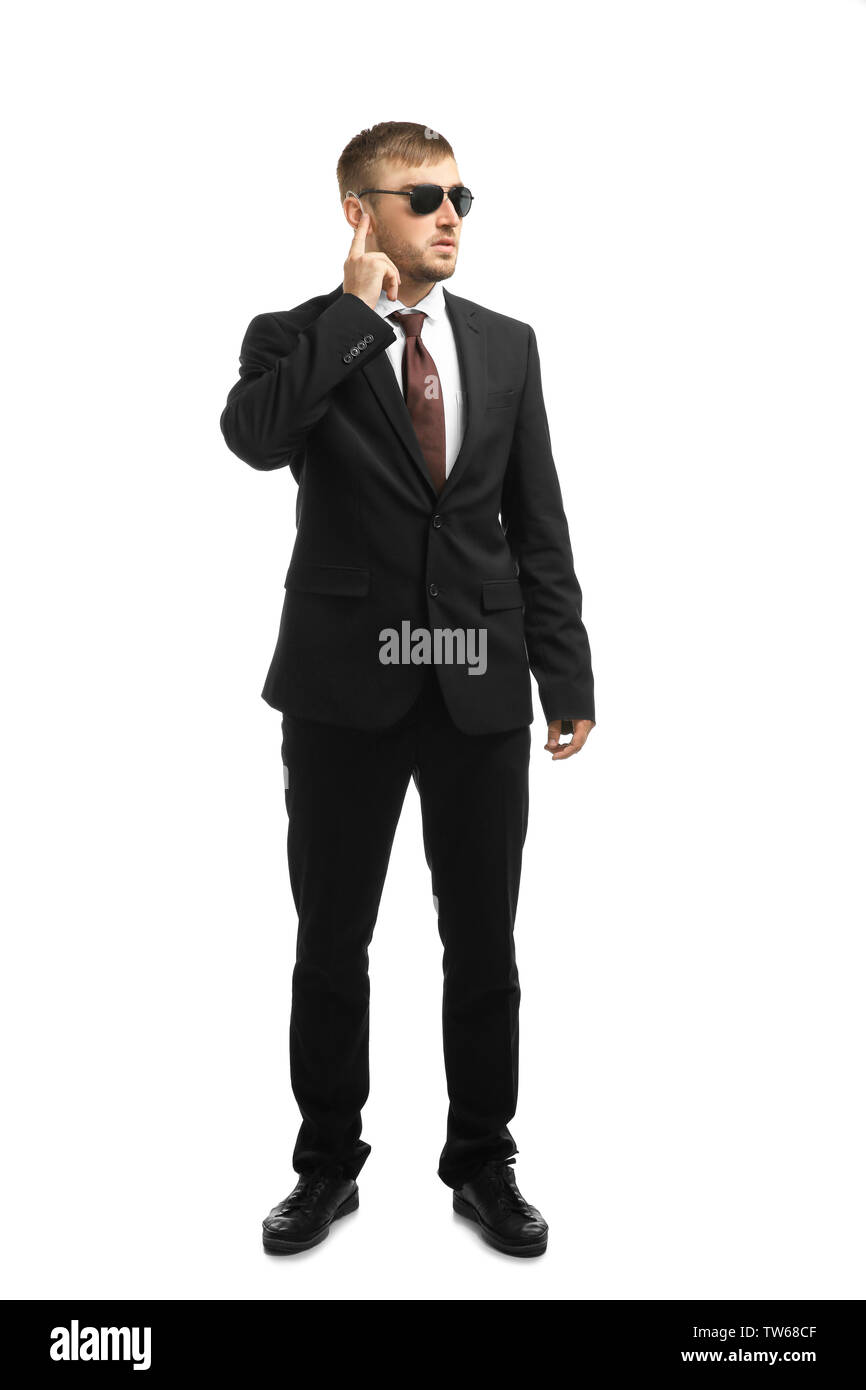 Handsome security guard on white background Stock Photo - Alamy