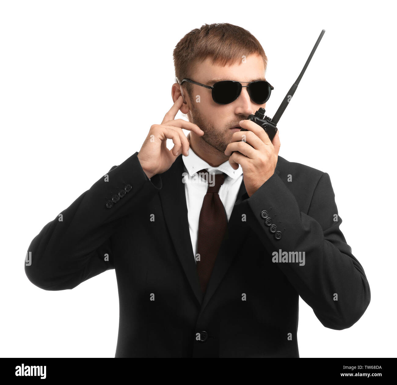 Handsome security guard on white background Stock Photo - Alamy