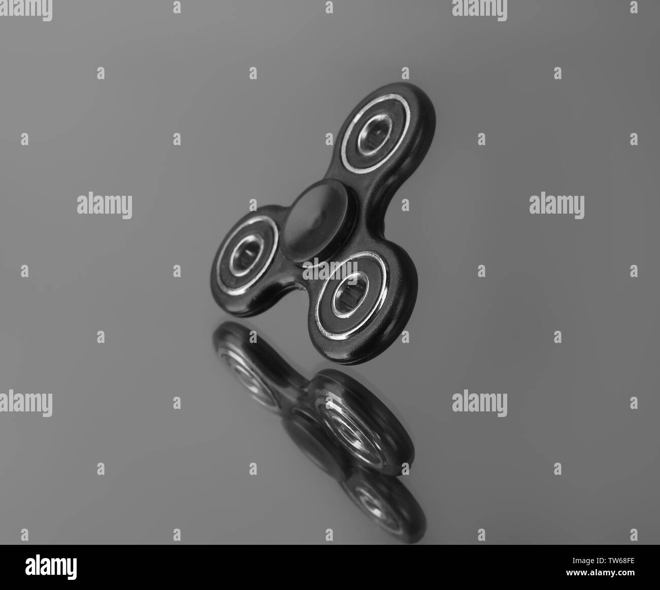 Fidget spinner Black and White Stock Photos & Images - Alamy
