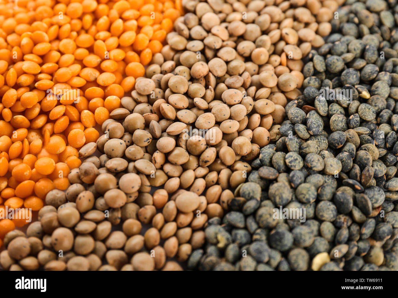Different types of lentils as background Stock Photo - Alamy