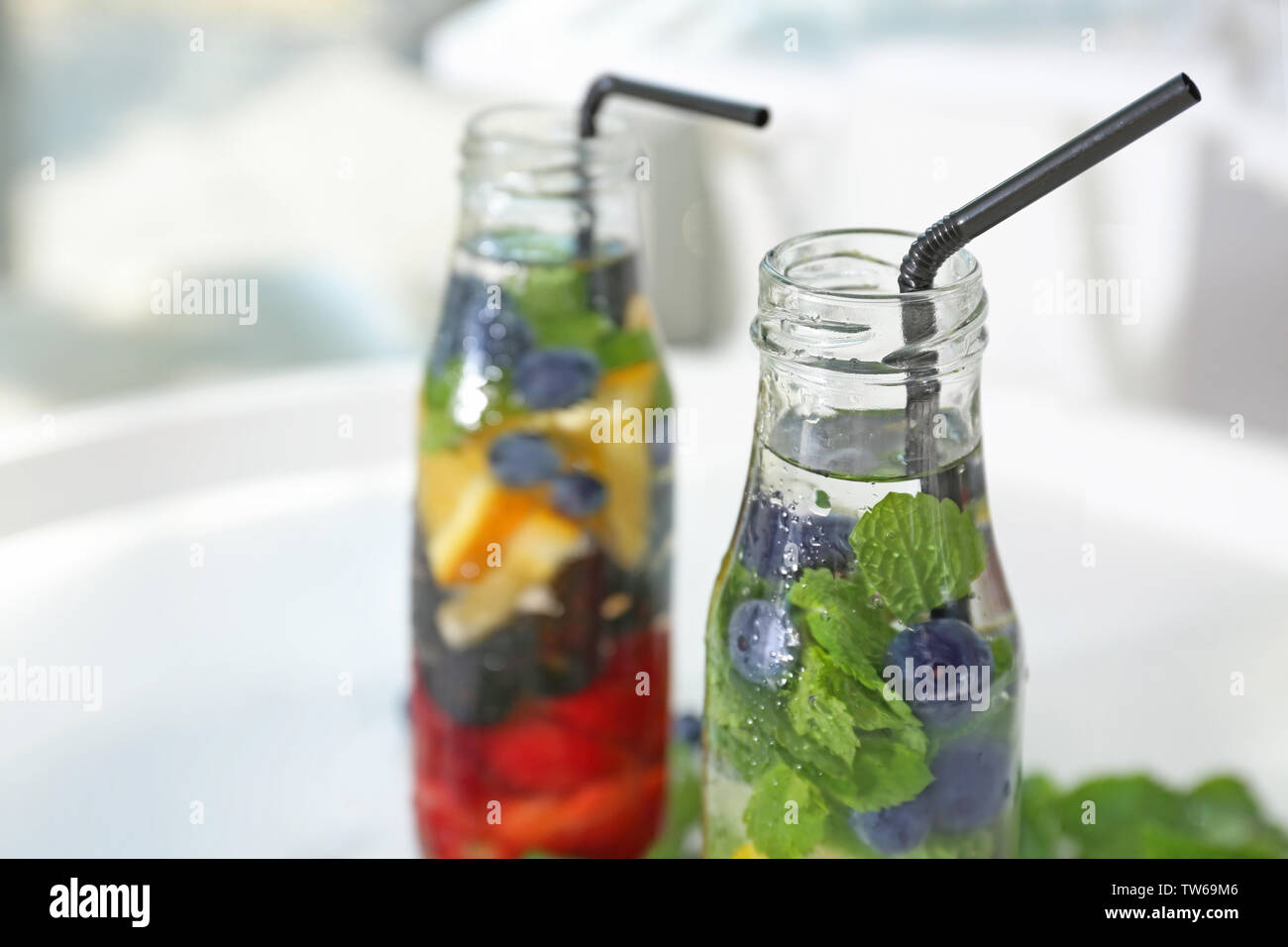 Bottles infused water berries hi-res stock photography and images - Alamy