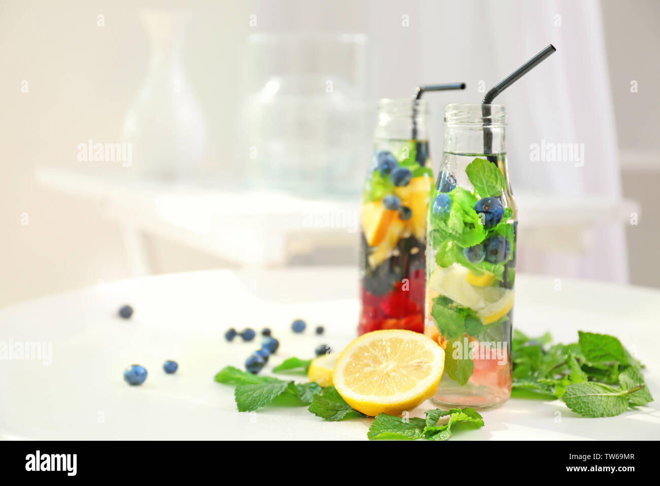 Bottles infused water berries hi-res stock photography and images - Alamy