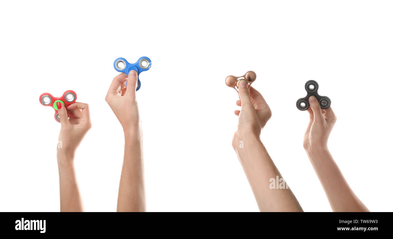 People holding different modern spinners, isolated on white Stock Photo ...