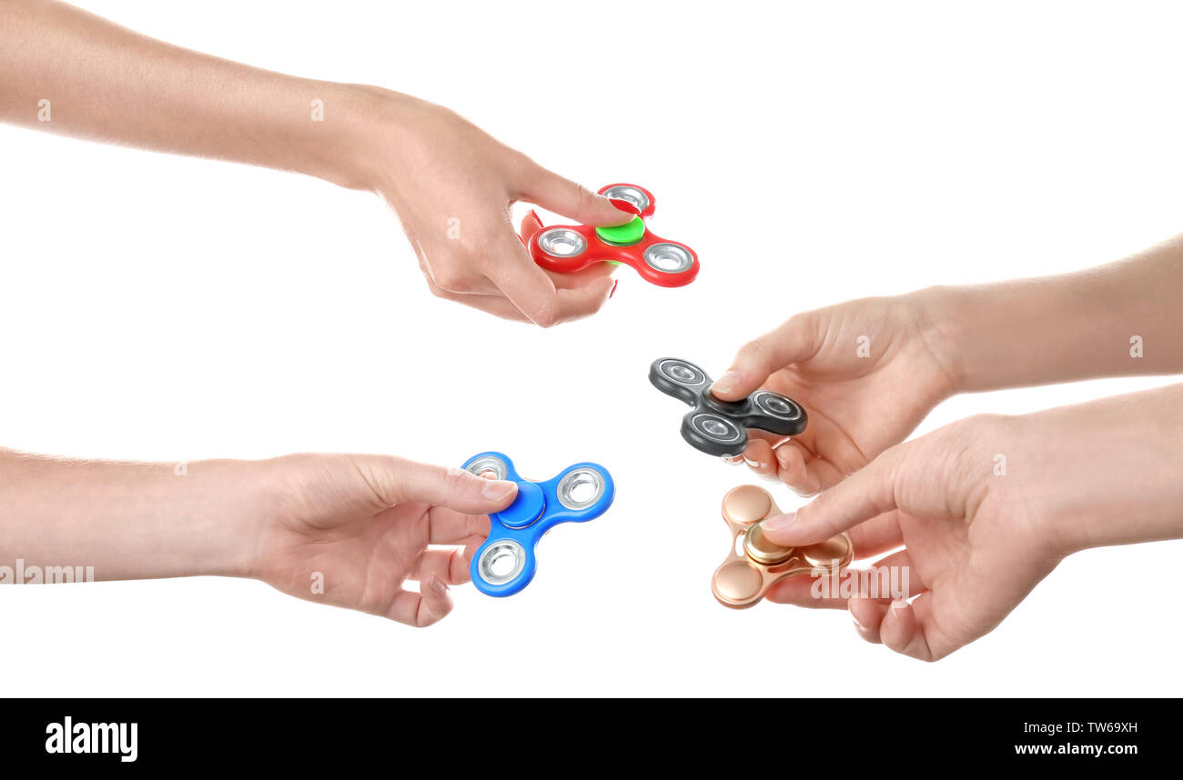 People holding different modern spinners, isolated on white Stock Photo ...