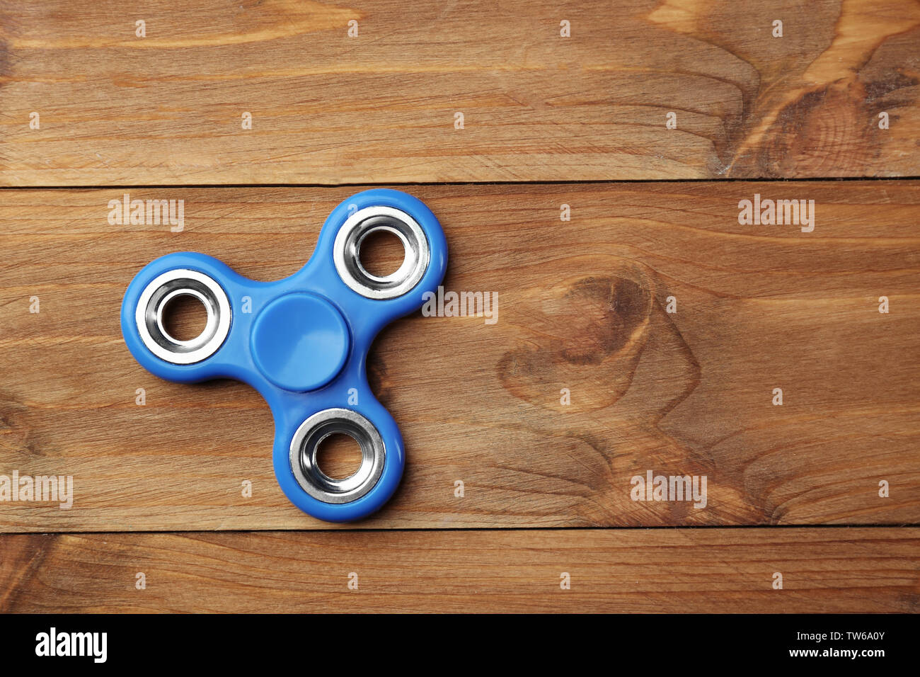 Wooden fidget spinner toy hi-res stock photography and images - Alamy